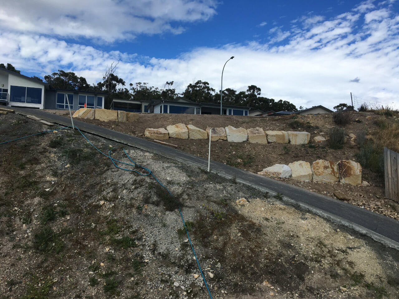 Steep Slope Solutions in Tranmere | Retaining Walls & Driveway Access